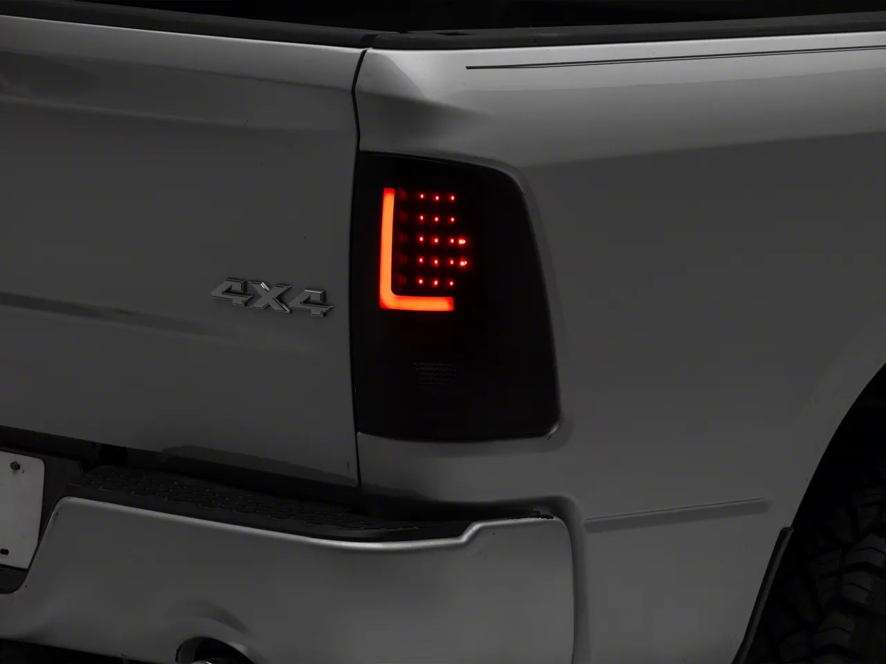 RAM 1500 L-Bar LED tail Lights; Black Housing; Smoked Lens (09-18 RAM ...