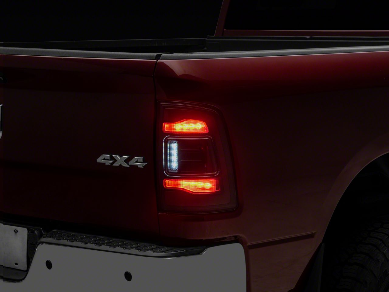 RAM 1500 Red LED Bar Tail Lights; Matte Black Housing; Clear Lens (09 ...